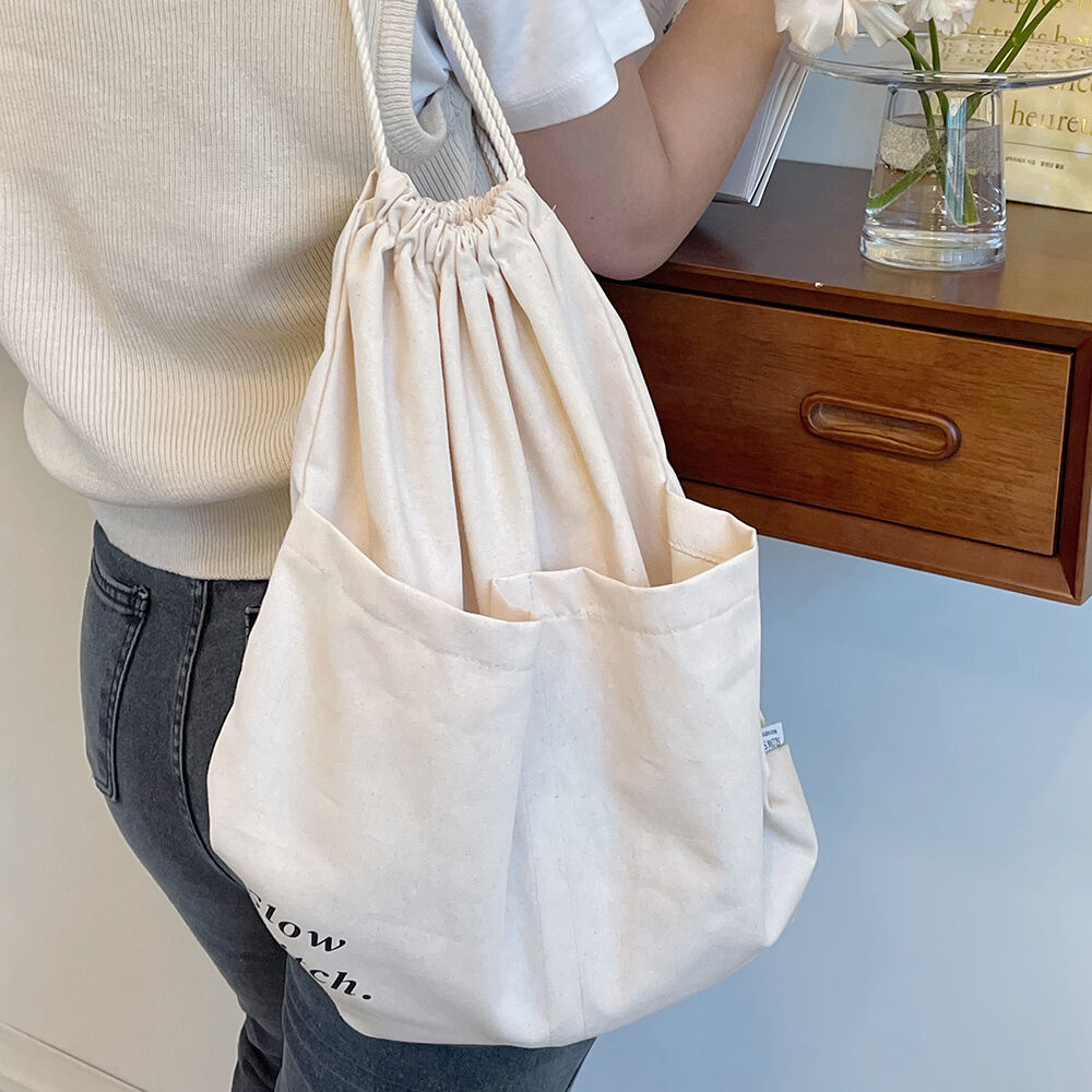 슬로우스티치 slowstitch string backpack ( ivory ) - 위시버킷