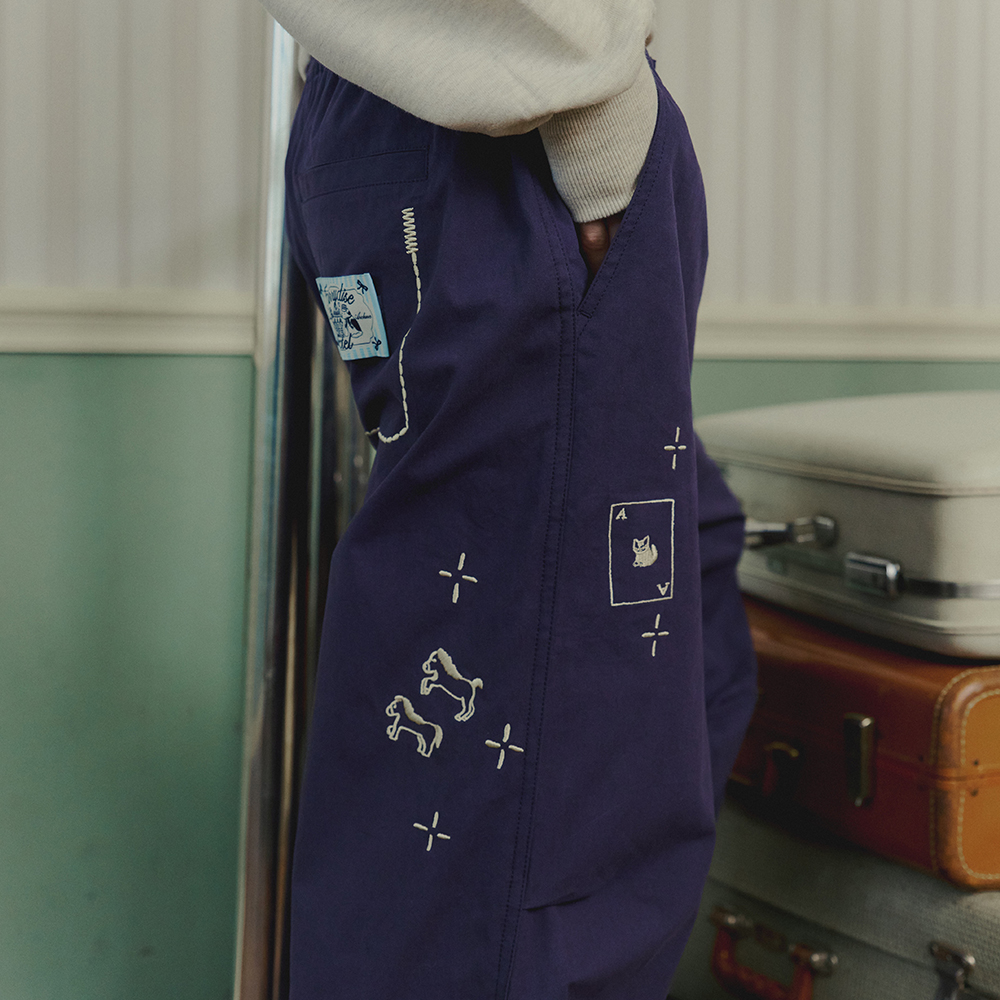 론론 [2/7 순차배송] DRAWING STITCH PARACHUTE PANTS NAVY - 위시버킷