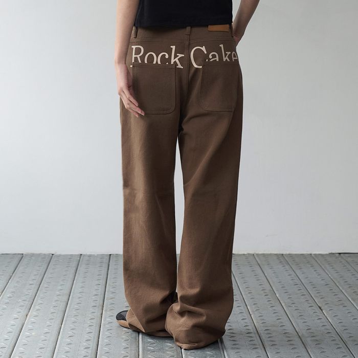 락케이크 Lettering Hide Pants - Brown - 위시버킷