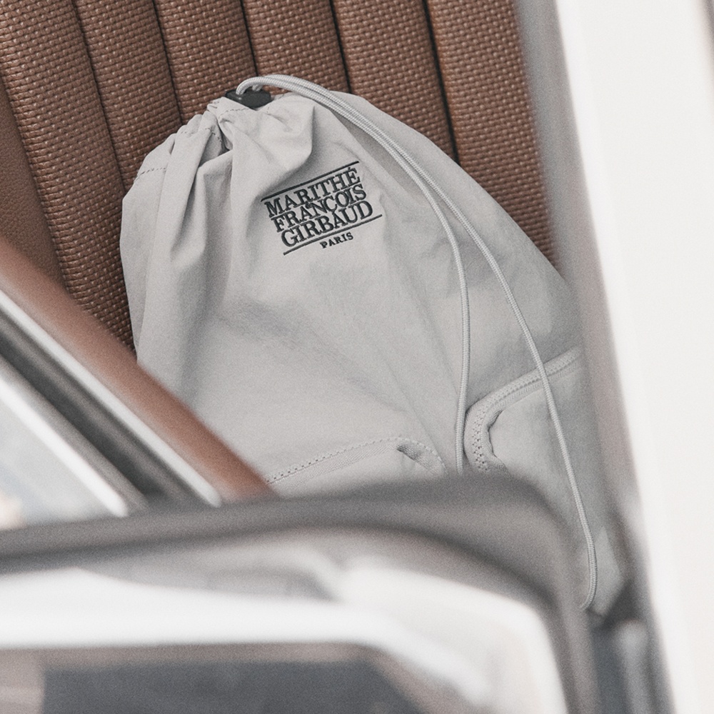 마리떼 CLASSIC LOGO STRING BACKPACK light gray - 위시버킷